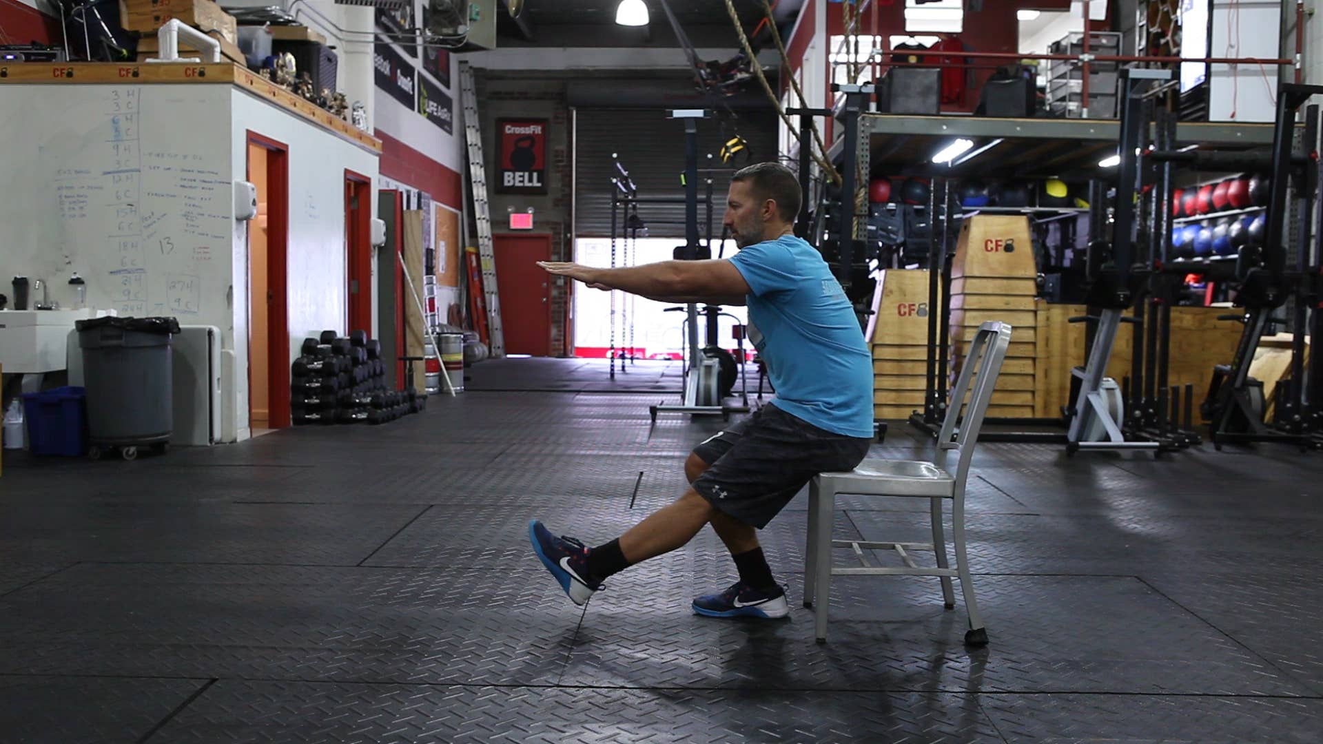 8 Exercises You Can Do With Just a Chair - Men's Journal