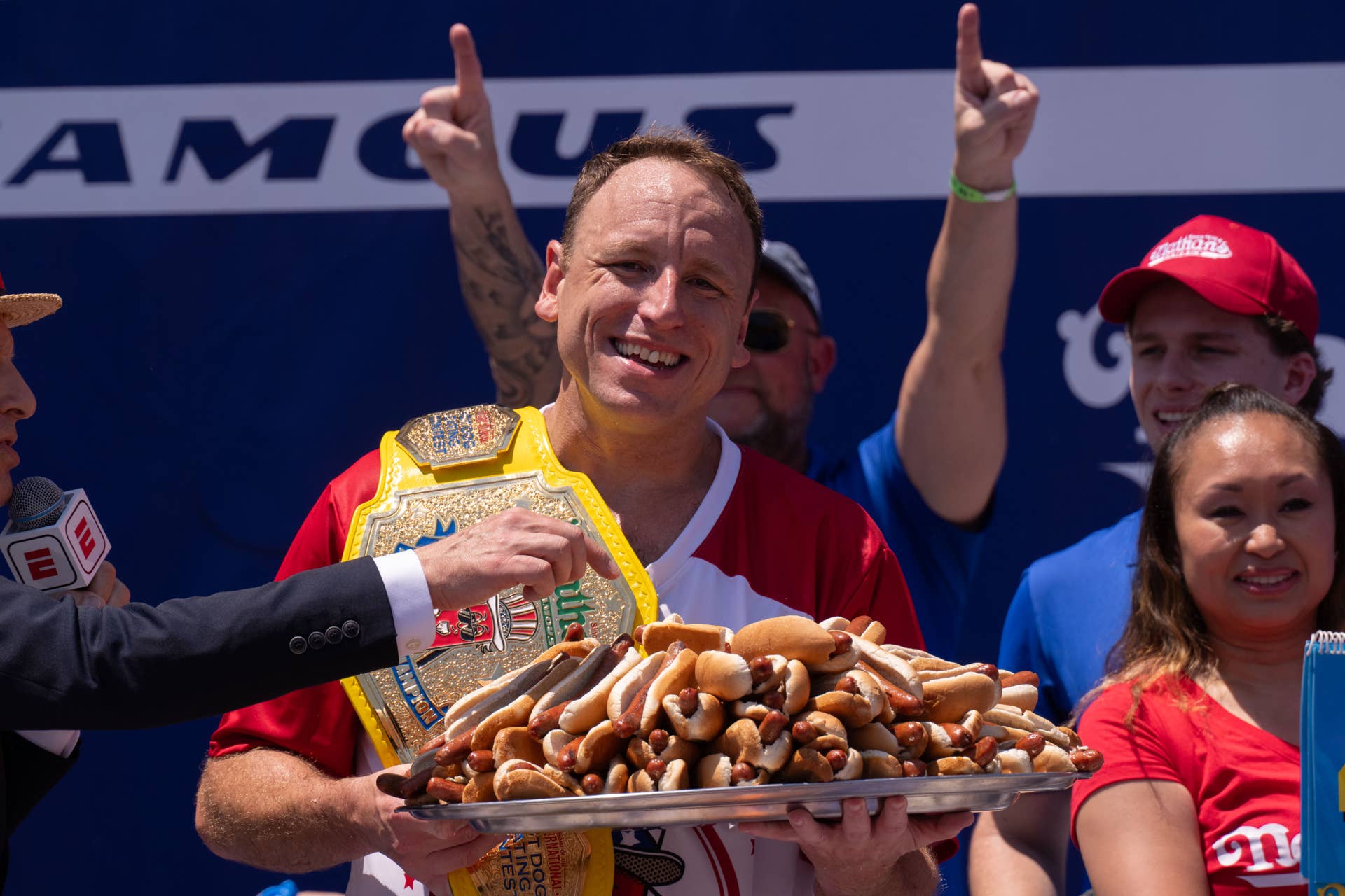 Joey Chestnut, Usain Bolt Hot Dog Race Debate Goes Viral - Men's Journal