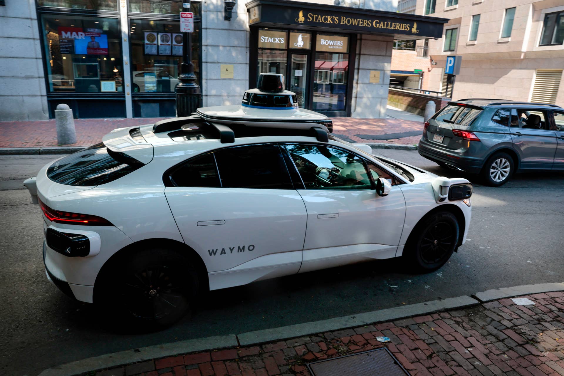 Waymo Robotaxis Crash at Airport, Sparking Multiple Tesla Debates - Men ...