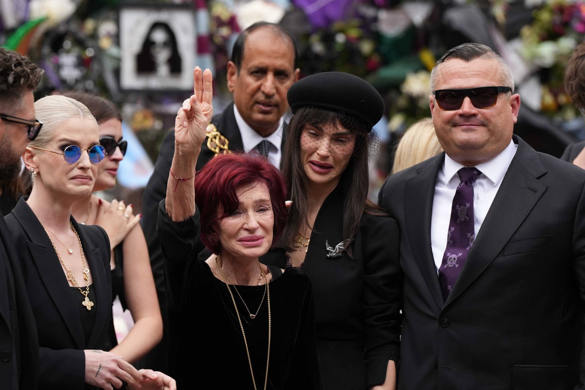 Kelly Osbourne Posts Photo from Ozzy’s Private Funeral - Men's Journal
