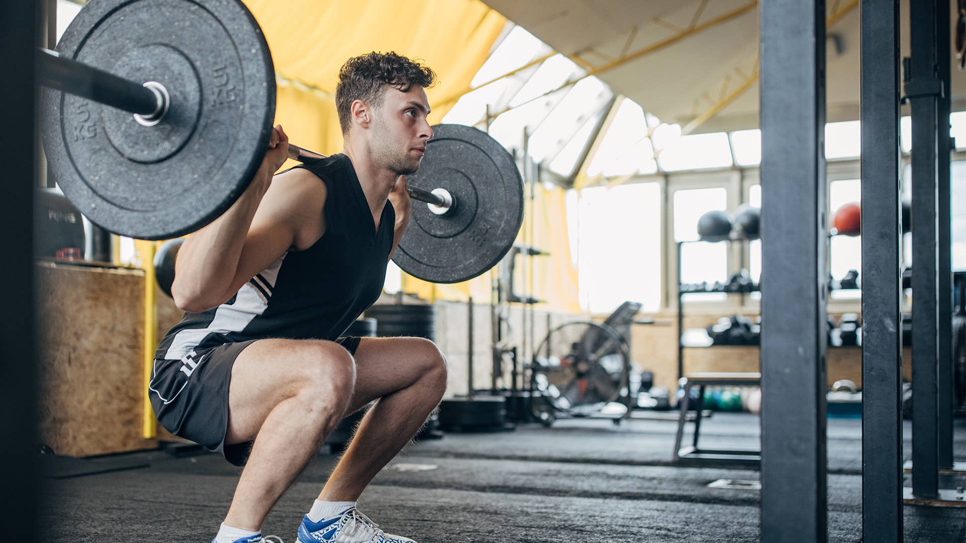 How to Master Sumo Squats for Powerful Hips and Quads - Men's Journal