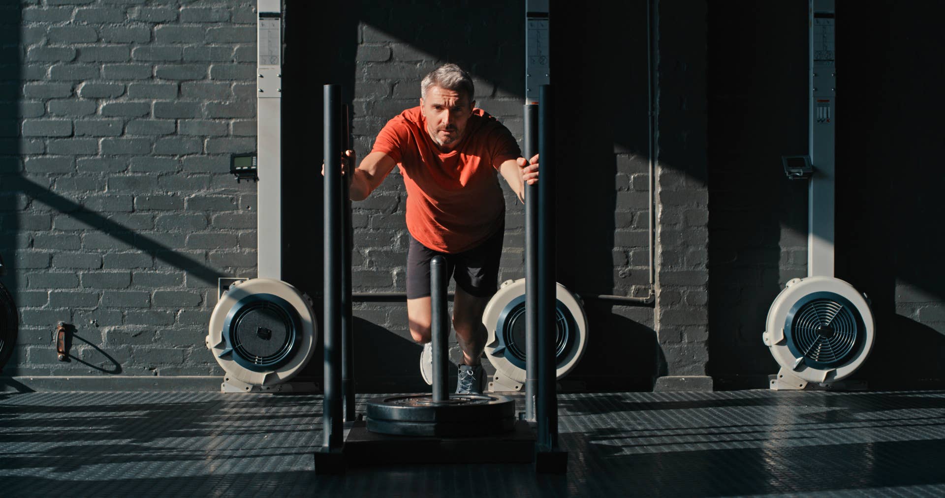 How Men Over 40 Can Build Strength and Endurance With Sleds - Men's Journal