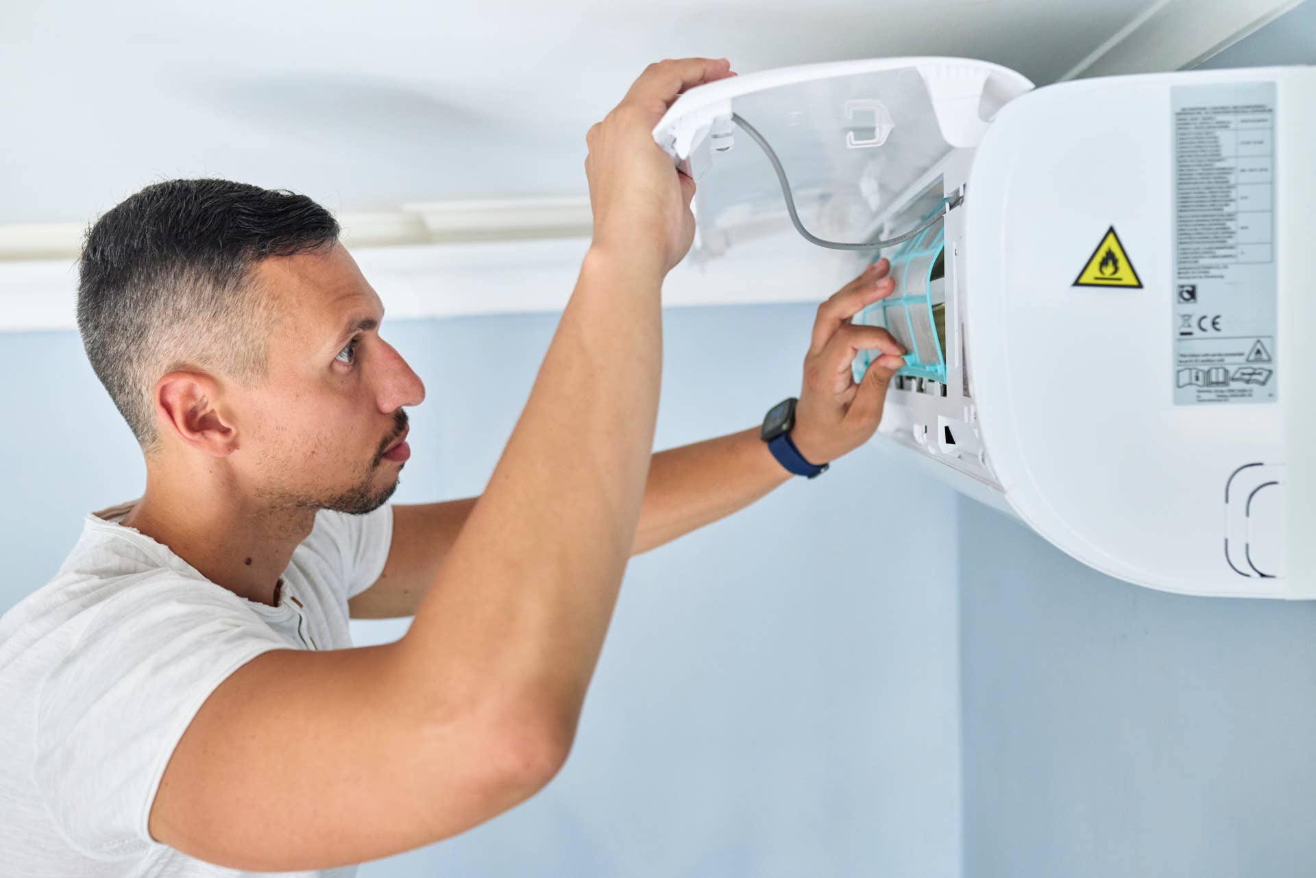 How to Change an Air Conditioner Filter Correctly - Men's Journal