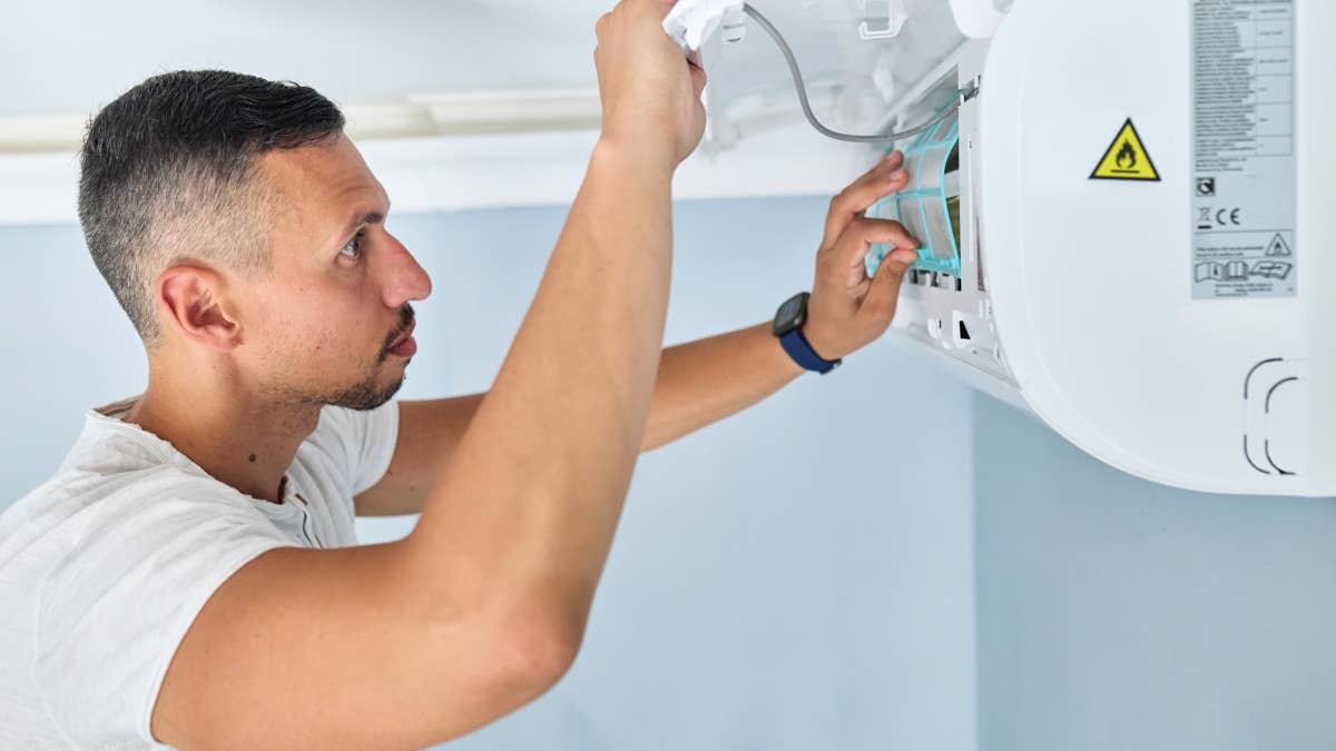 How to Change an Air Conditioner Filter Correctly - Men's Journal