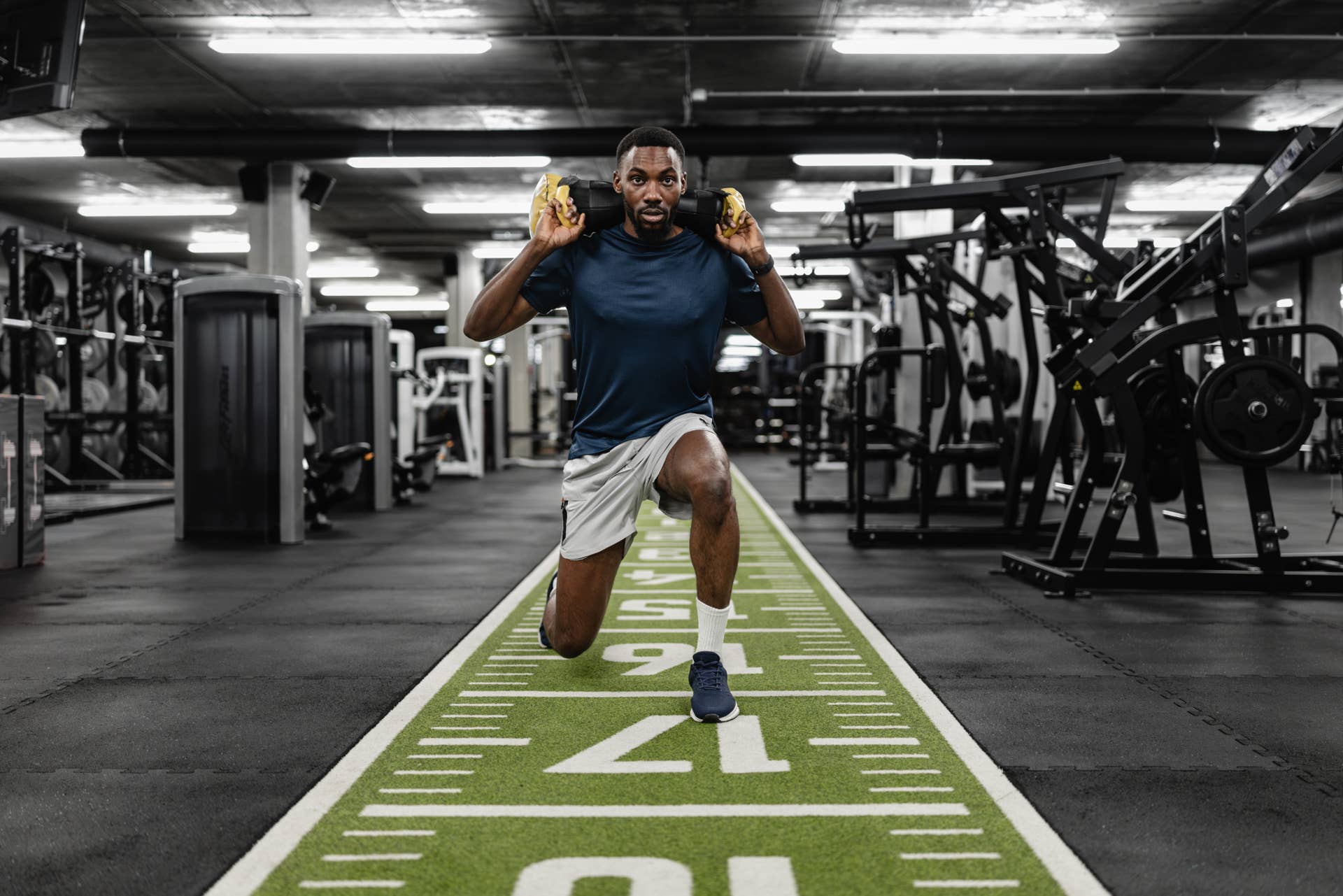 The Biggest HYROX Sandbag Lunge Mistakes to Avoid - Men's Journal