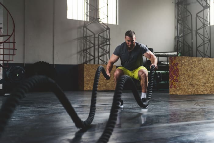 5 Combat Rope Moves to Torch Your Metabolism - Men's Journal