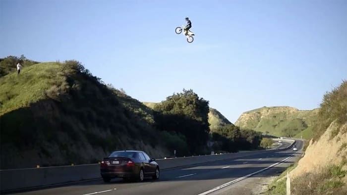 Dirt bike rider who jumped over freeway critically injured jumping ...