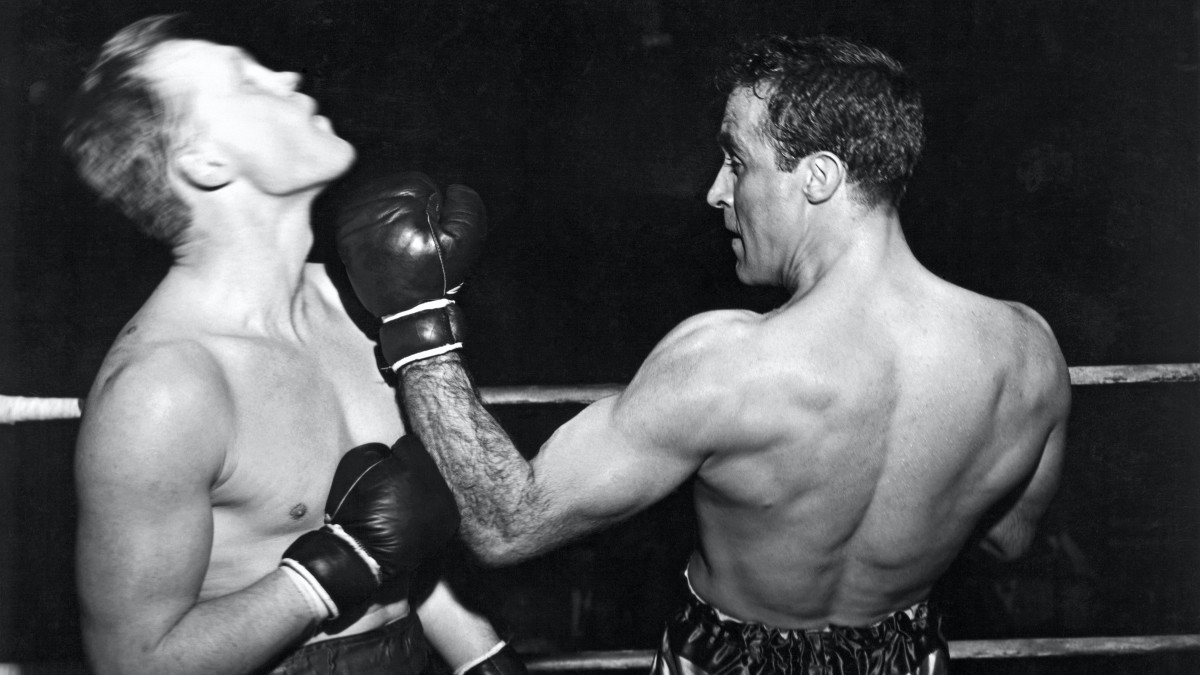 How to Take a Punch, According to a Pro Fighter | Men's Journal