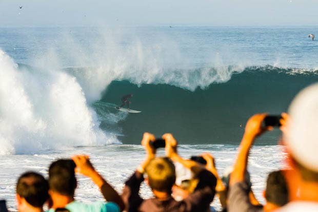 Surfers brave massive waves at the Wedge