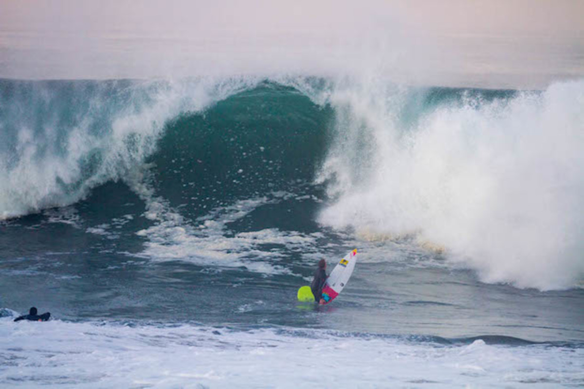 Surfers brave massive waves at the Wedge