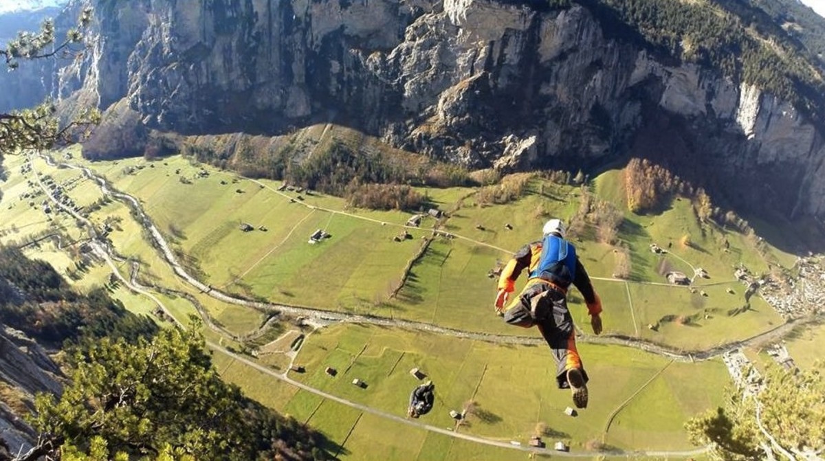 World’s first fire-breathing BASE jump - Men's Journal