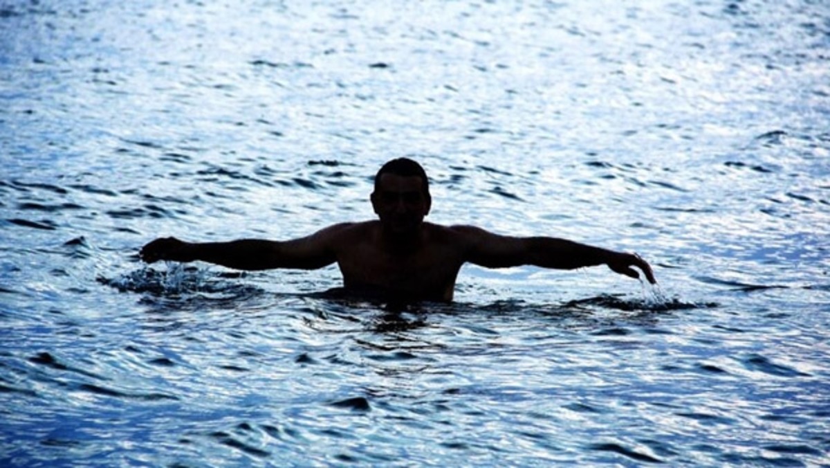 9 Best Swimming Workouts for Summer - Men's Journal