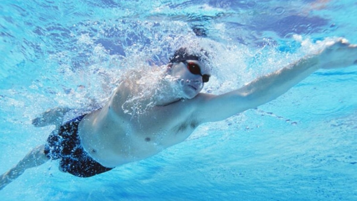 9 Best Swimming Workouts for Summer - Men's Journal