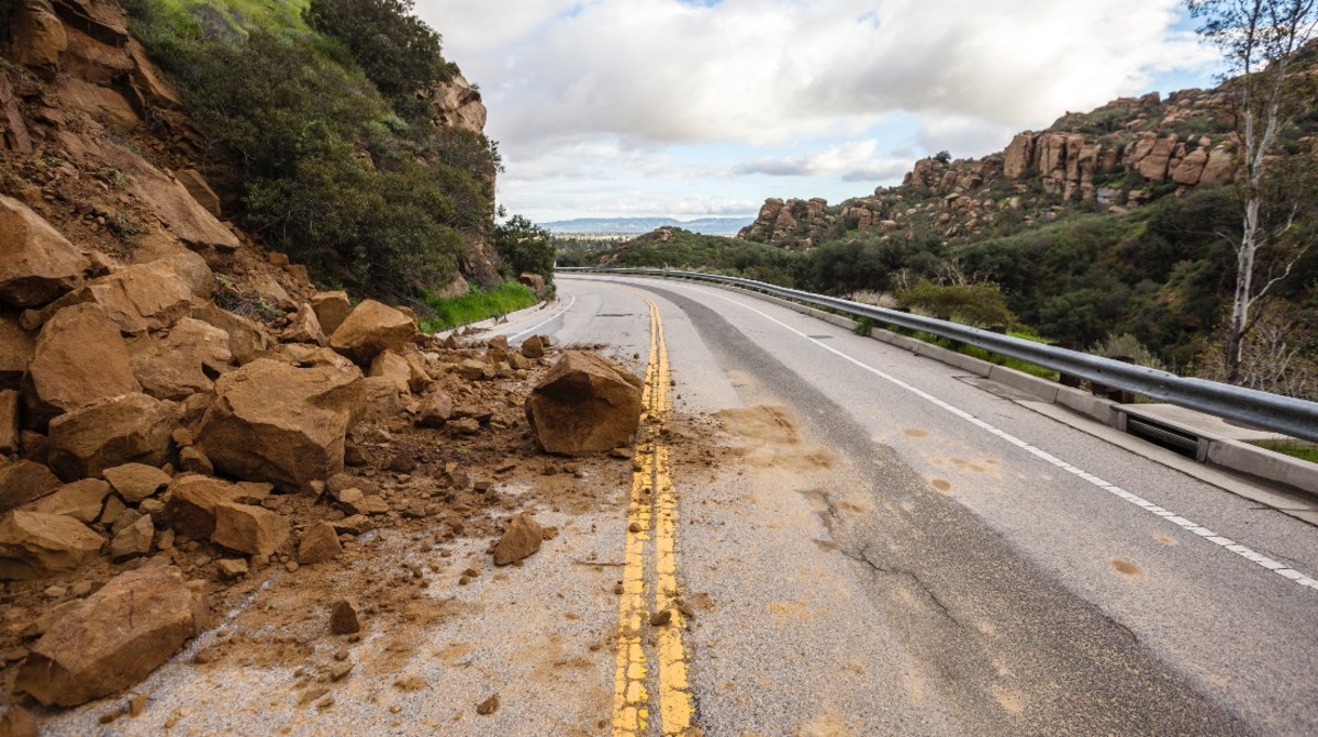 Dashcam Footage Shows Rockslide Crushing Trucks on Peru Highway