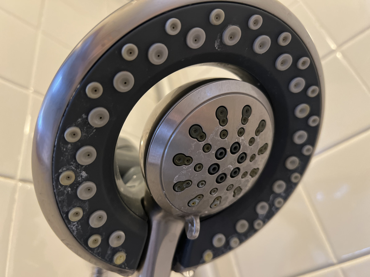 How To Clean A Showerhead Mens Journal Home Living Handbook