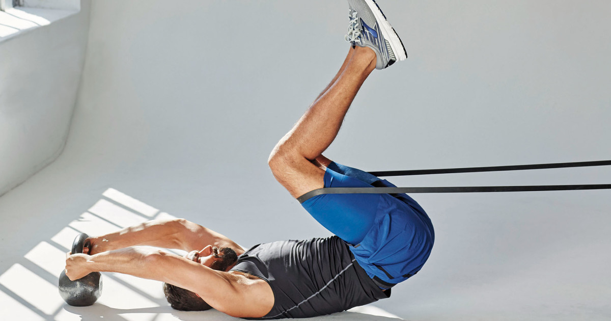 How to Do a Reverse Banded Crunch - Men's Journal