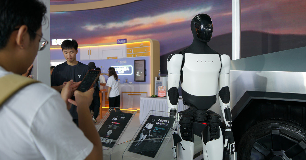 New Tesla Optimus Video Shows Humanoid Robot Doing Household Chores ...