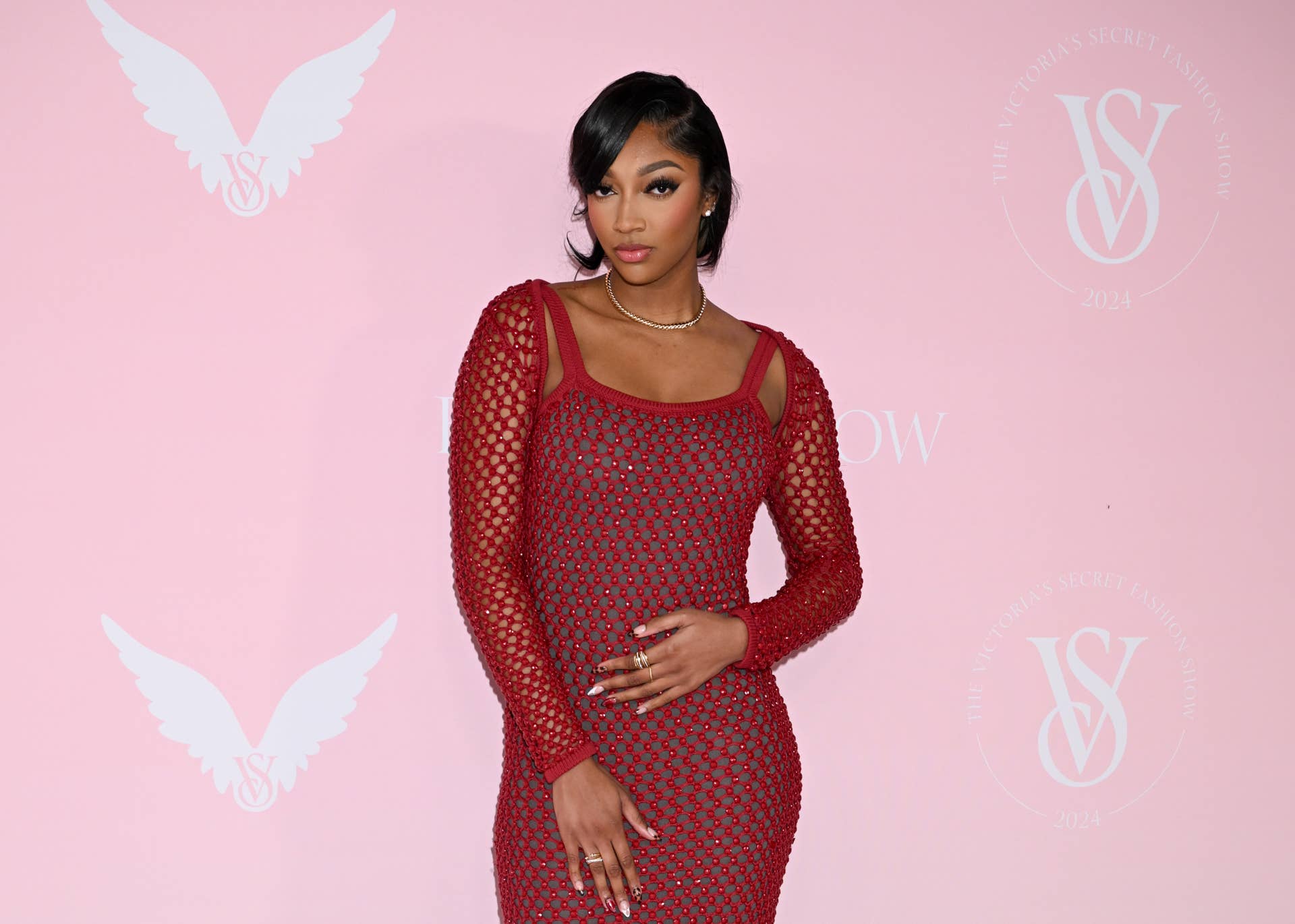 Angel Reese Causes a Stir With Outfit While Sitting Courtside - Men's ...