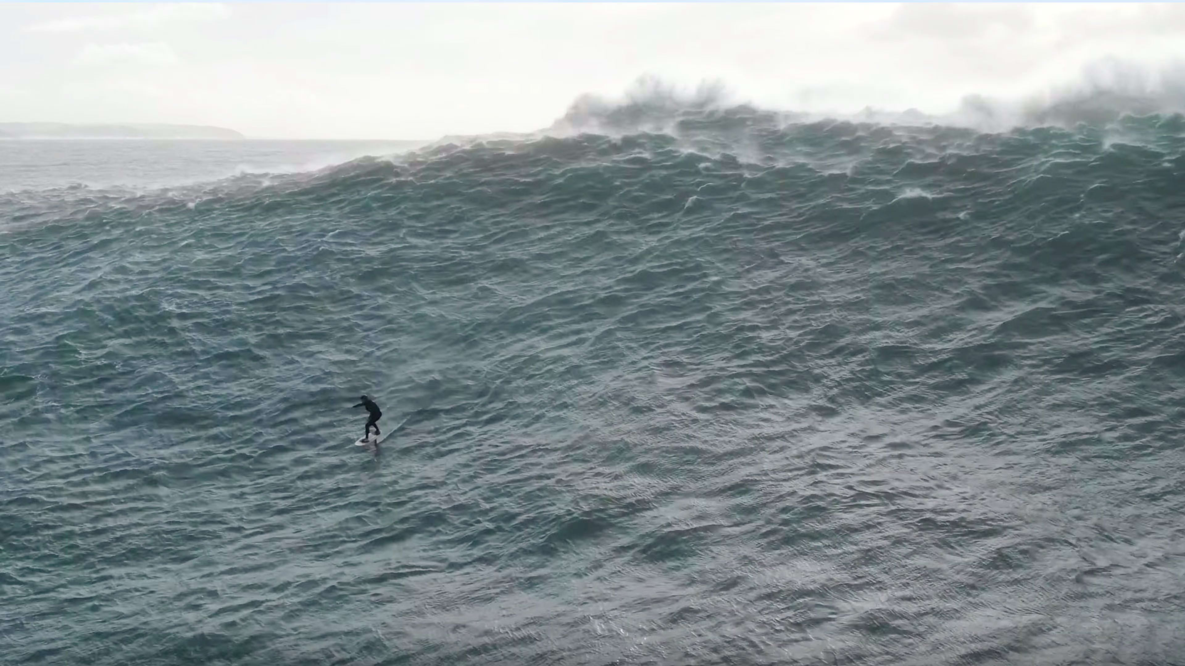 Laird Hamilton and Crew Surf Massive Waves at Nazaré on Foil Boards ...
