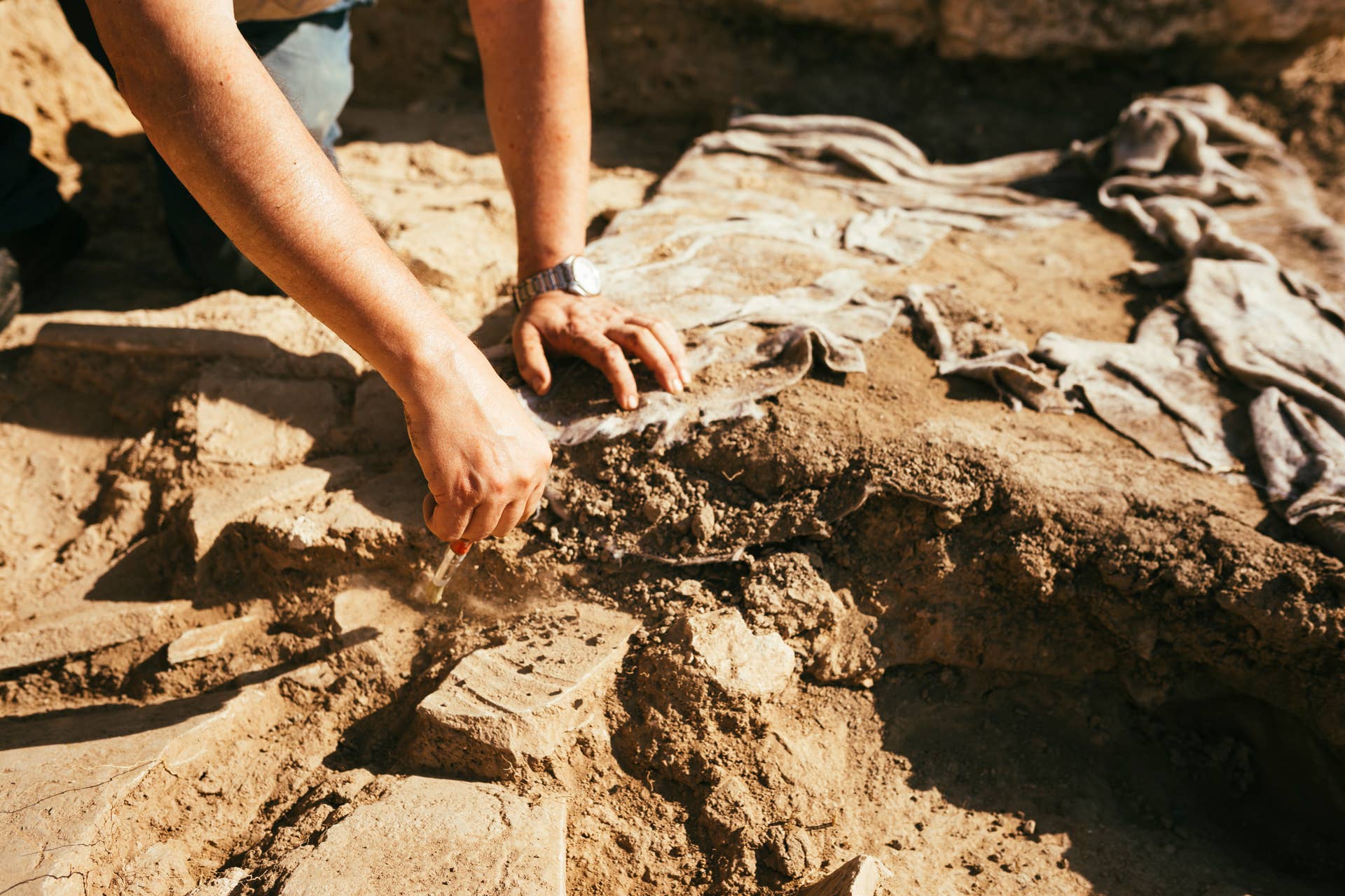 Archaeologists Unearth 'Very Rare' Bone, Ebony Figures in Graves - Men ...