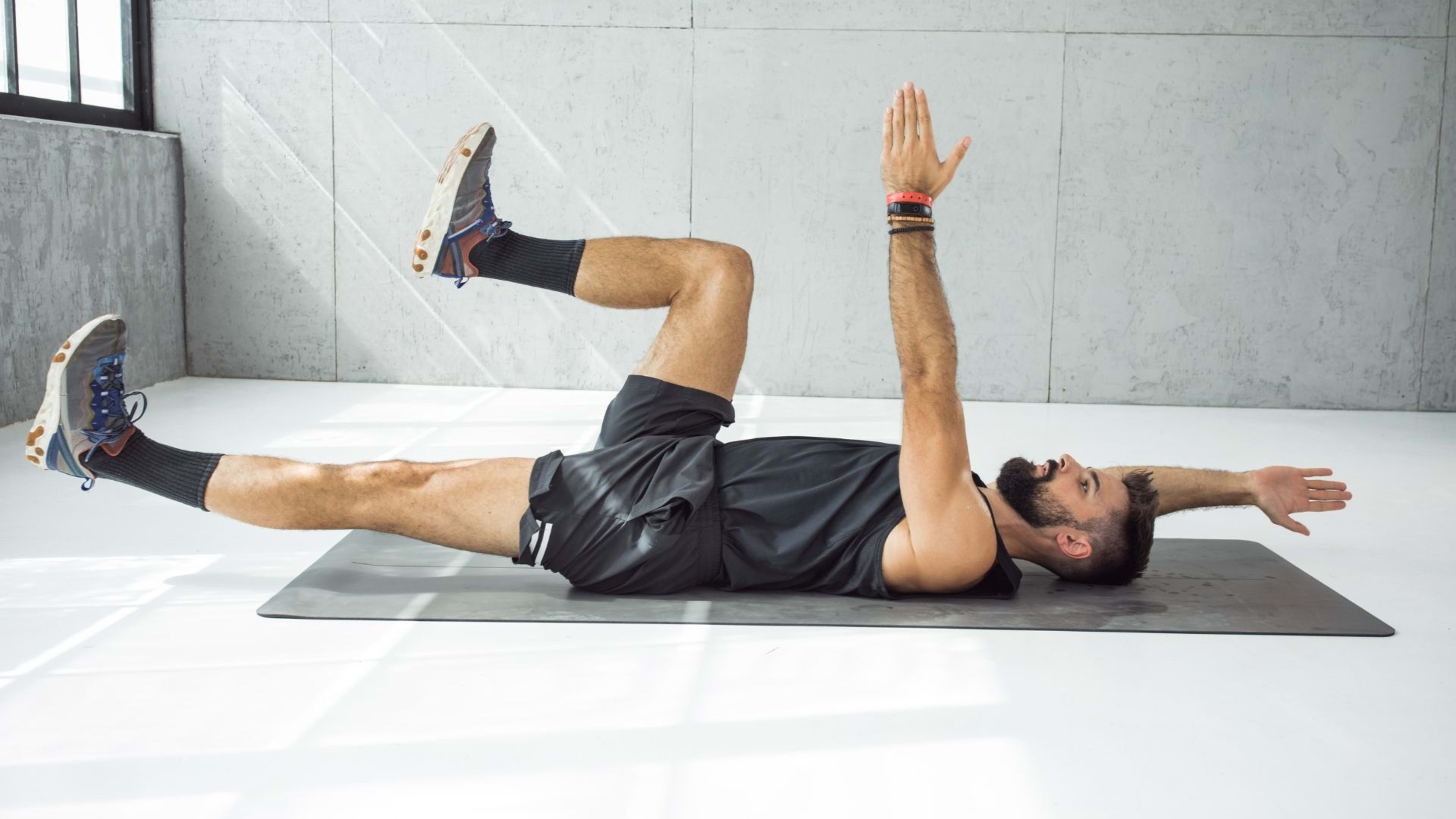 How to Do the Dead Bug for Core Strength and Stability - Men's Journal